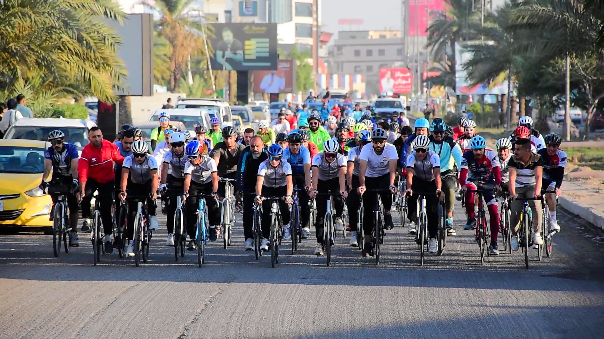 Cyclists celebrate Arab Cyclist Day with marathon through Baghdad ...